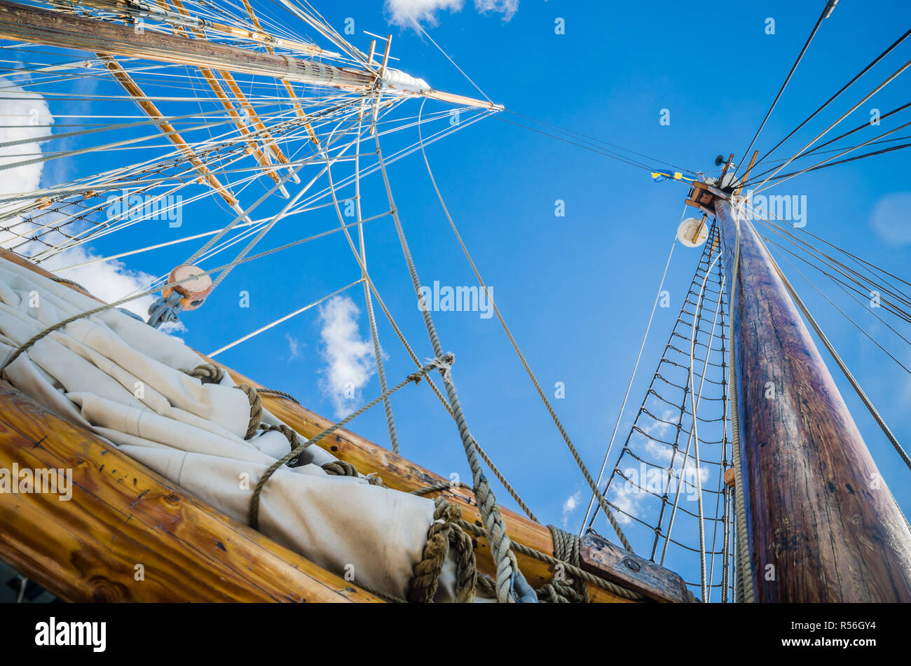 Folded sail and mast on an old sailboat Stock Photo - Alamy