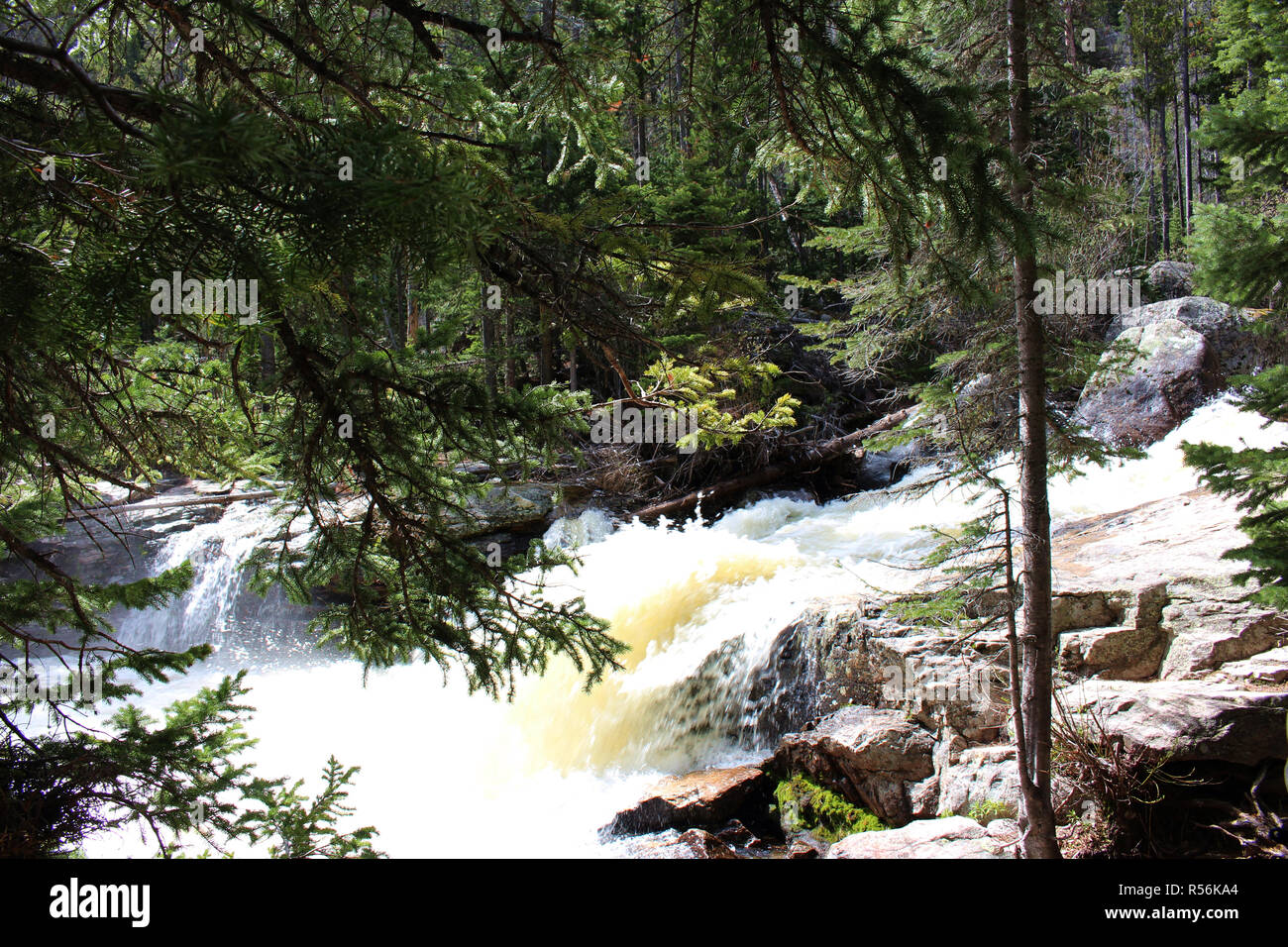 The rushing water of Copeland Falls flowing over rocks and boulders in ...
