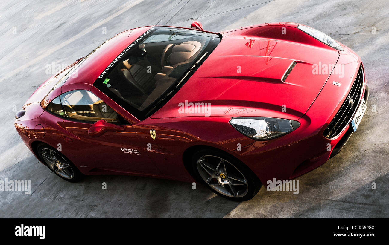 Red Ferrari shot in Barcelona harbour Stock Photo - Alamy