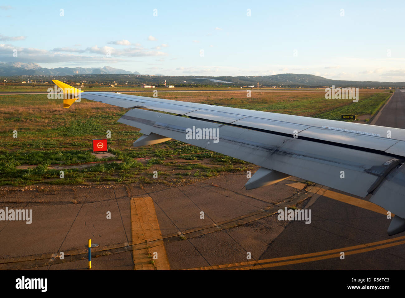 Airplane riding on takeoff strip in the airport, view from airplane ...