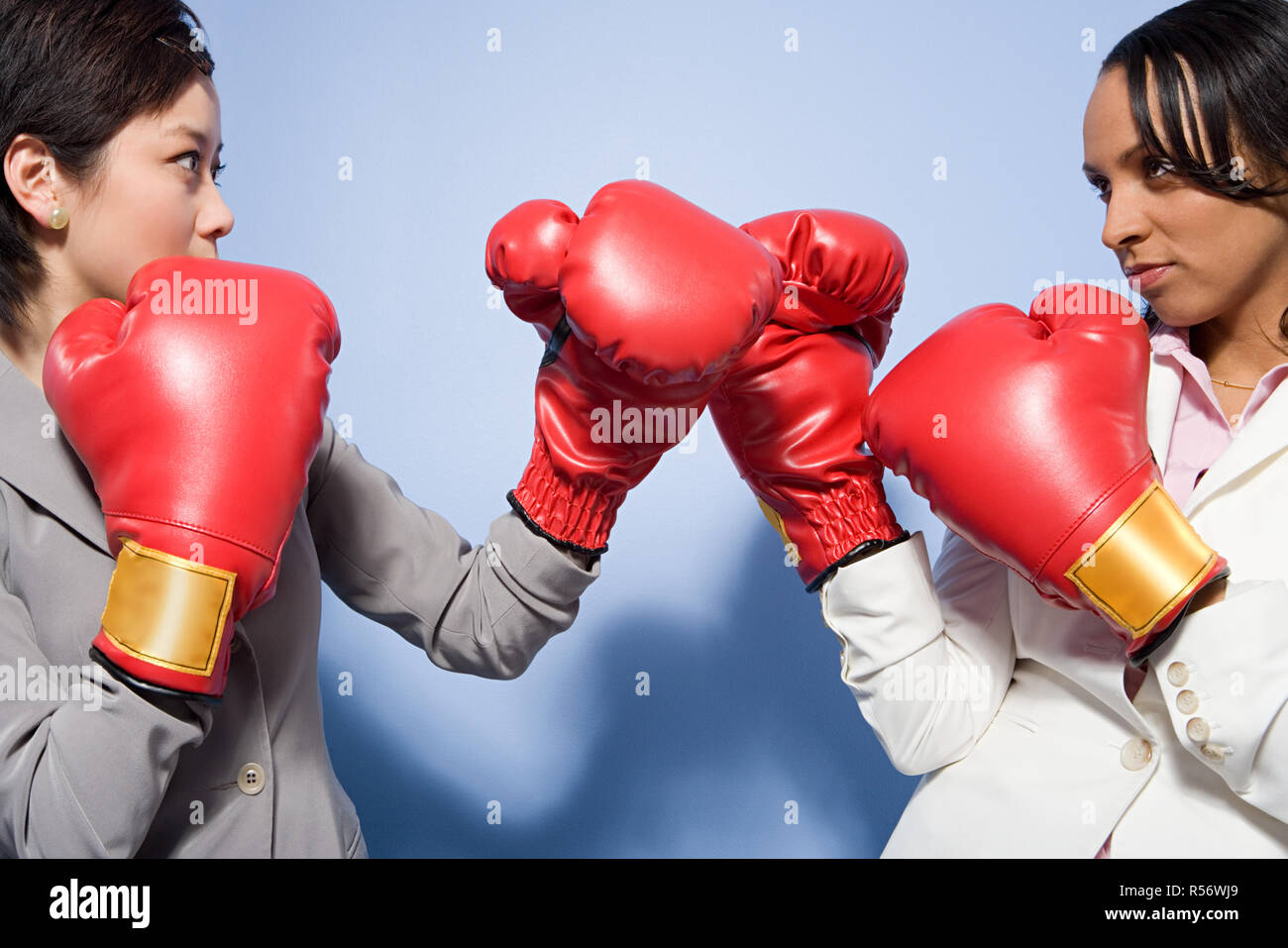 Office rivalry two young beautiful hi-res stock photography and images ...