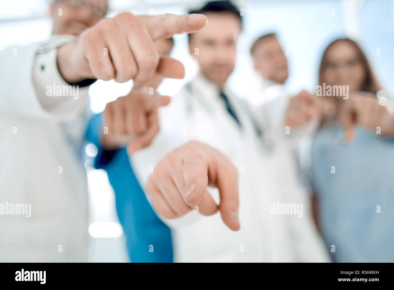 Doctor pointing viewer hi-res stock photography and images - Alamy