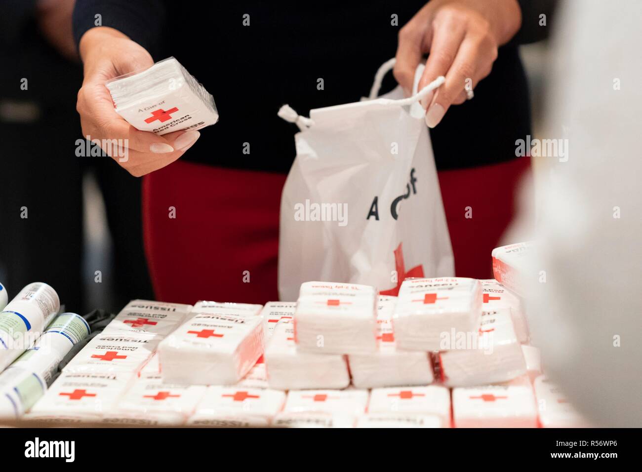 U.S First Lady Melania Trump helps volunteers assemble military care ...