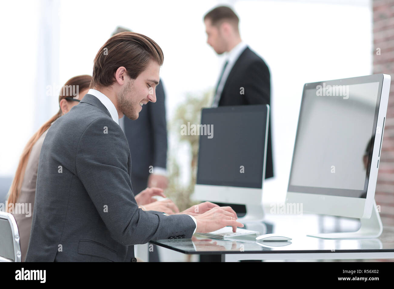 employees of the company work in the office Stock Photo - Alamy
