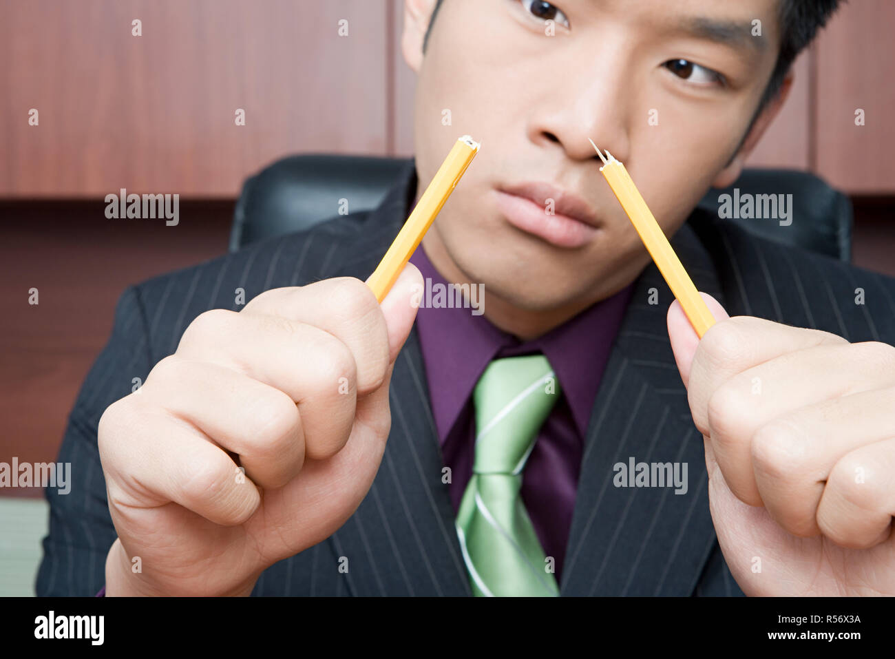 Businessman breaking pencil hi-res stock photography and images - Alamy