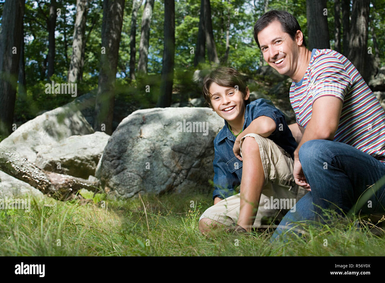 Father and son in forest Stock Photo - Alamy