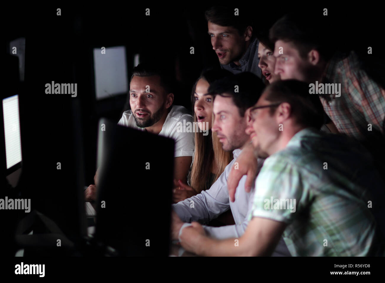 successful business team in the workplace at night Stock Photo - Alamy