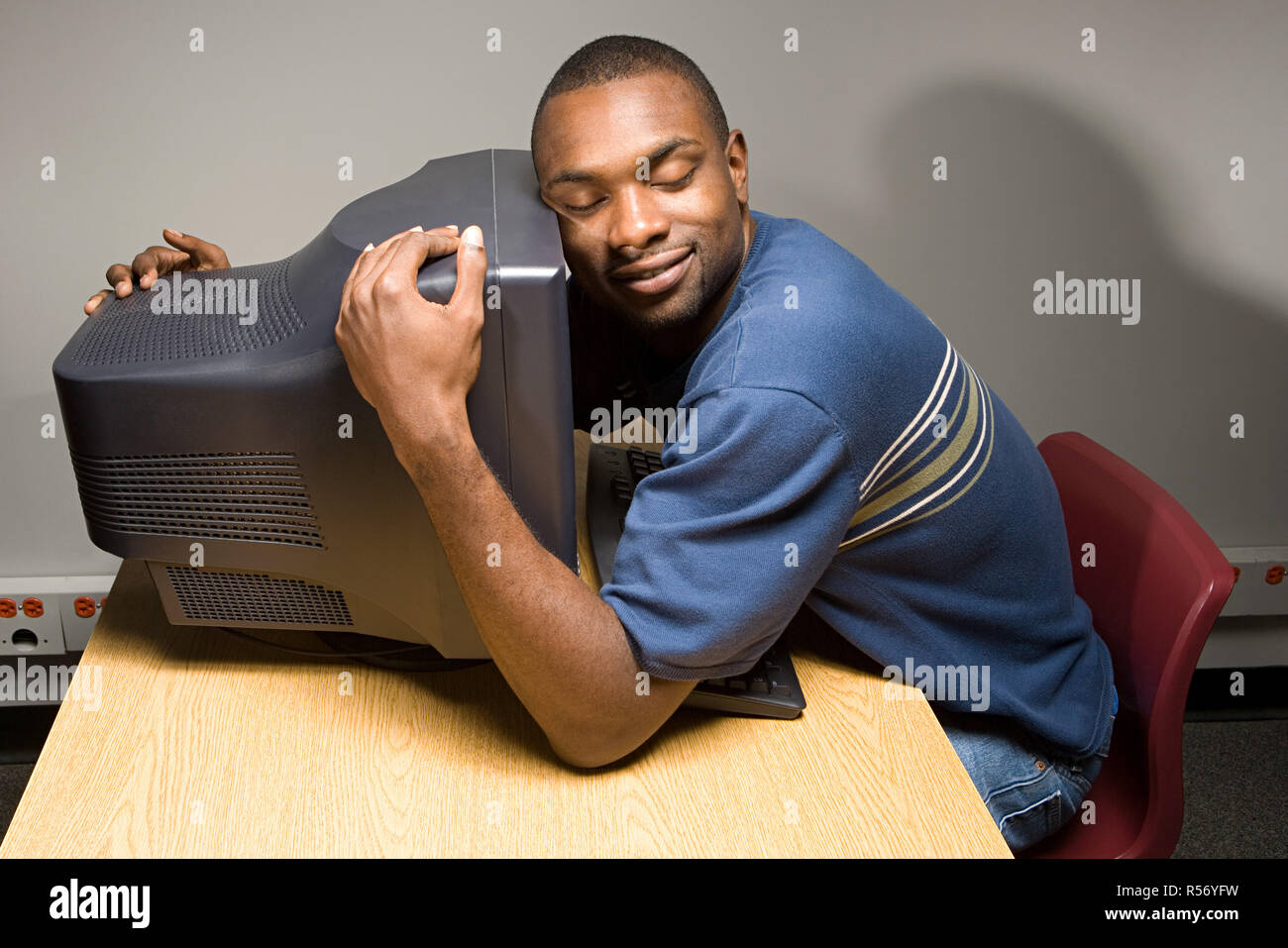 Male student sleeping on his computer Stock Photo - Alamy