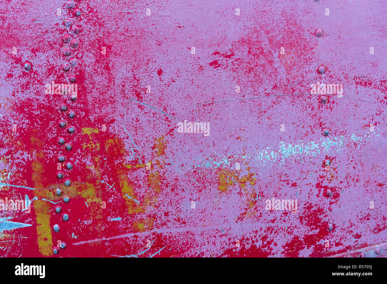 texture of old red painted weathered steel board with several layers of ...