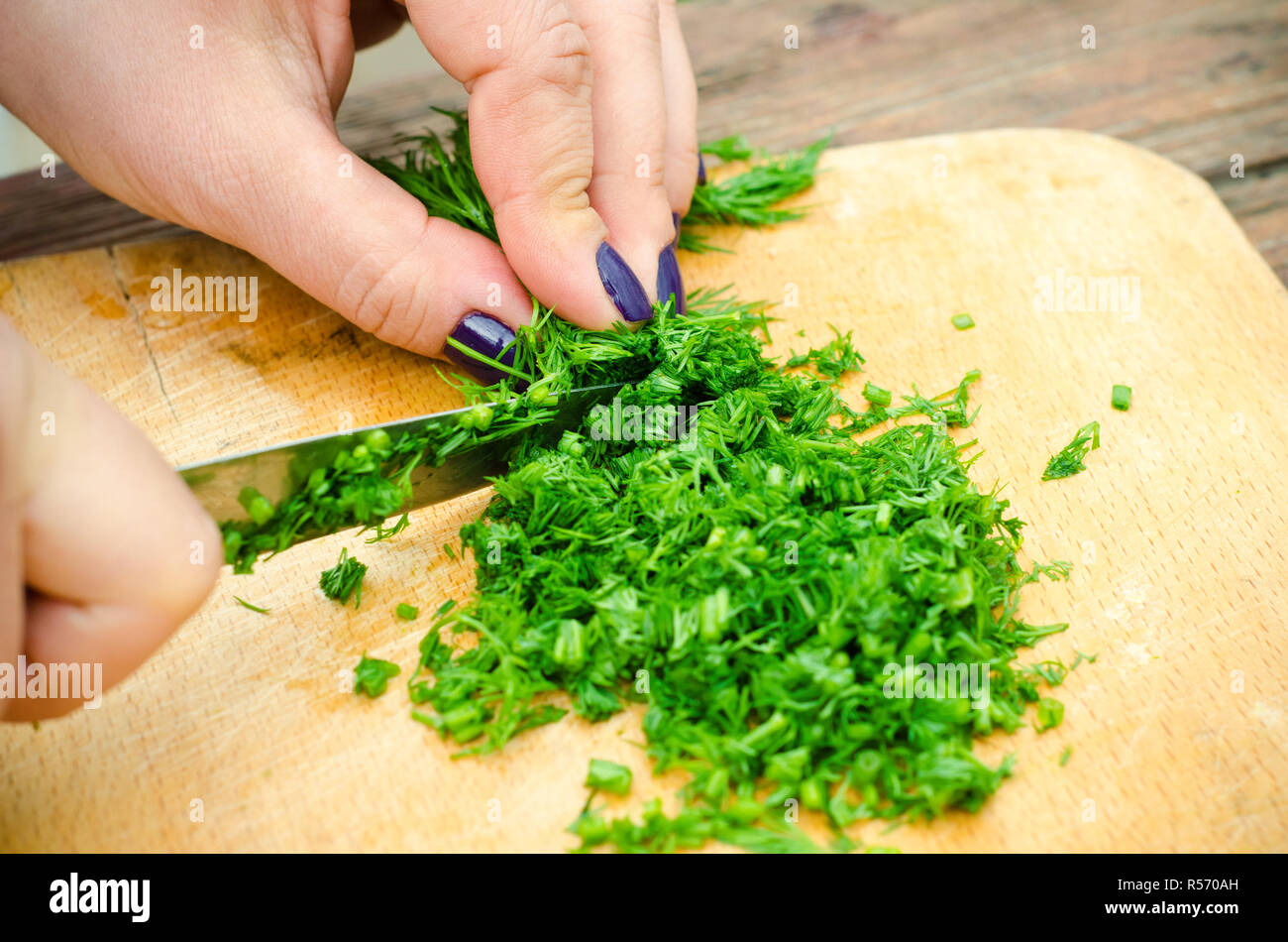 green parsley cutting with knife Stock Photo - Alamy