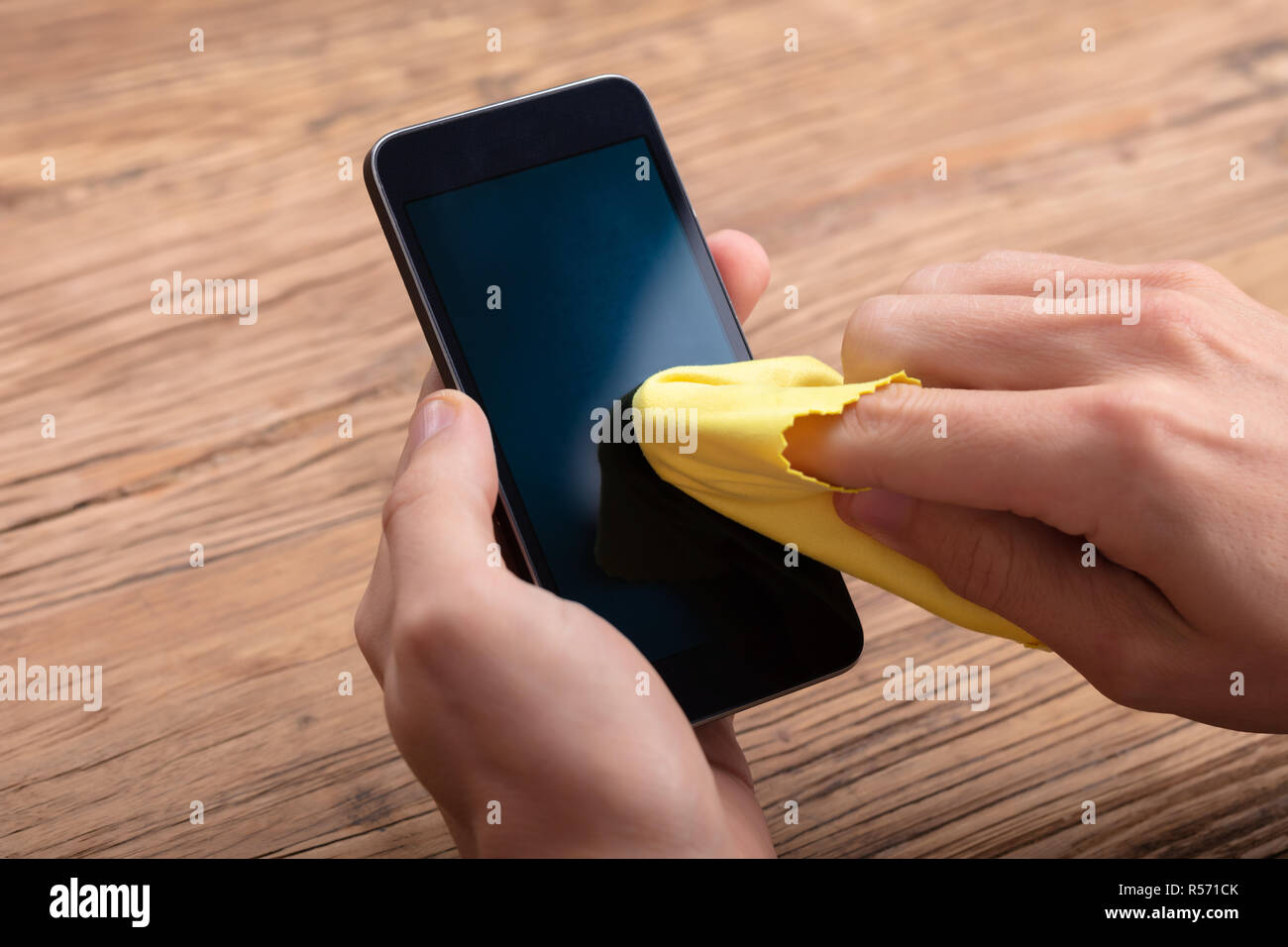 Hand holding cloth as screen hi-res stock photography and images - Alamy