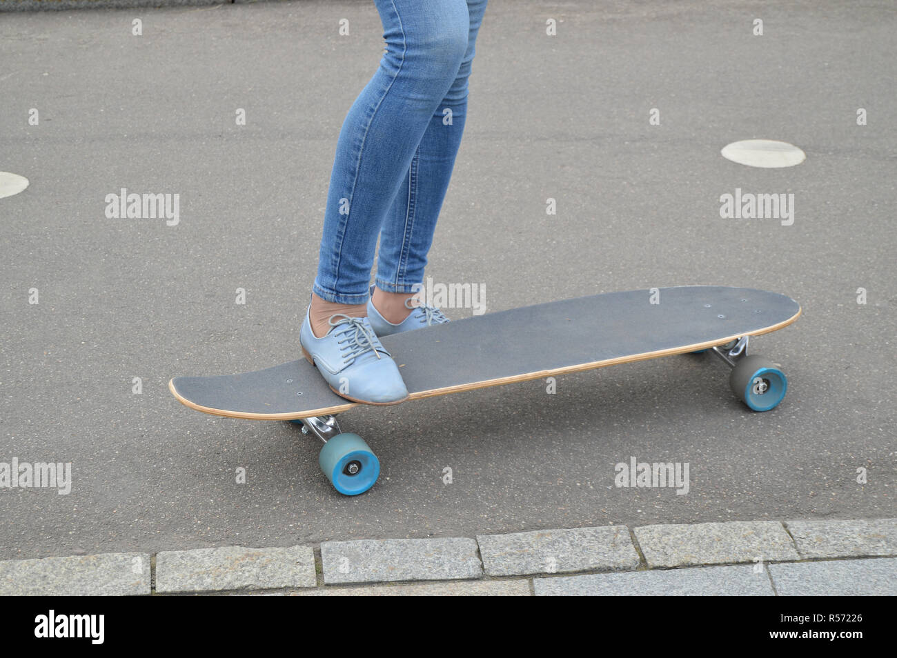 skateboarder, skateboarding female feet in the skatepark Stock Photo ...