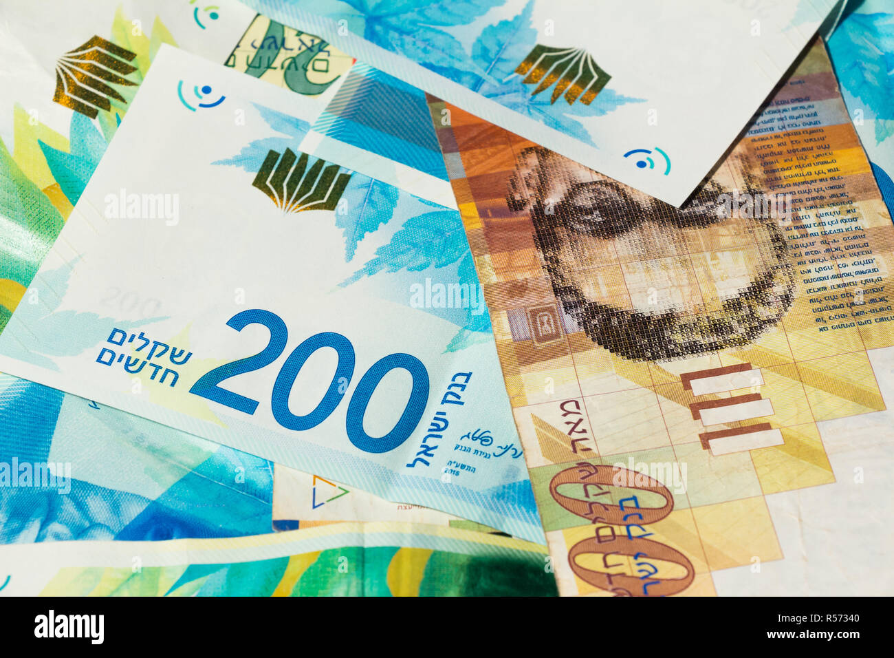 Stack of various of israeli shekel money bills - Top View Stock Photo ...