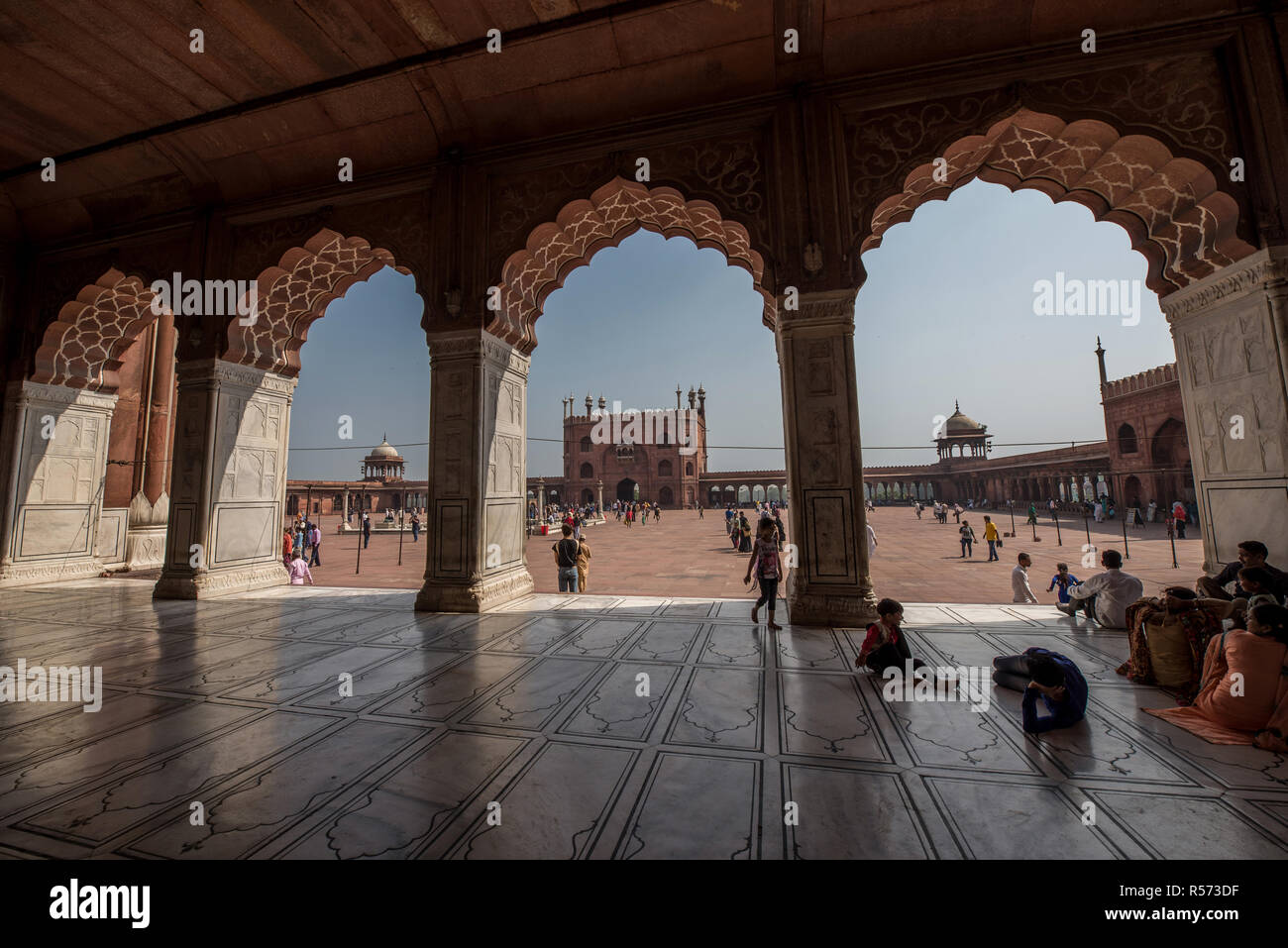 People relaxing under the shade of Jama Masjid mosque porches, Old ...