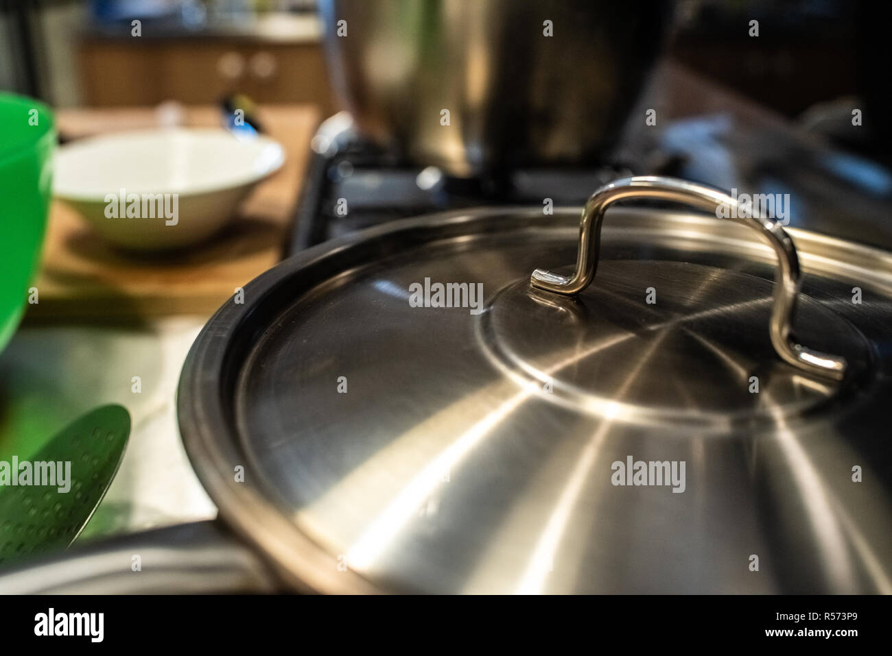 Metal pot in a restaurant kitchen Stock Photo - Alamy