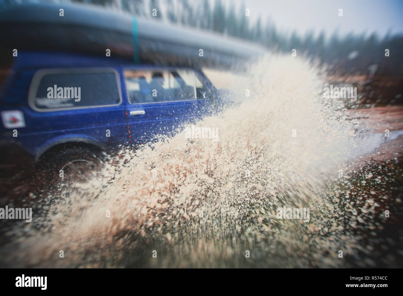 Suv offroad 4wd car rides through muddy puddle, off-road track road ...