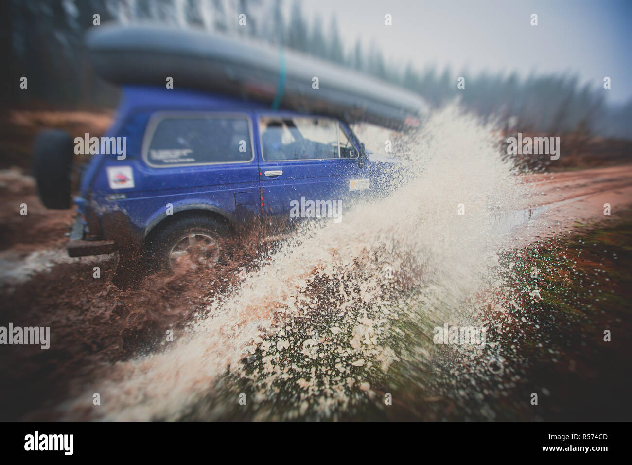 Suv offroad 4wd car rides through muddy puddle, off-road track road ...