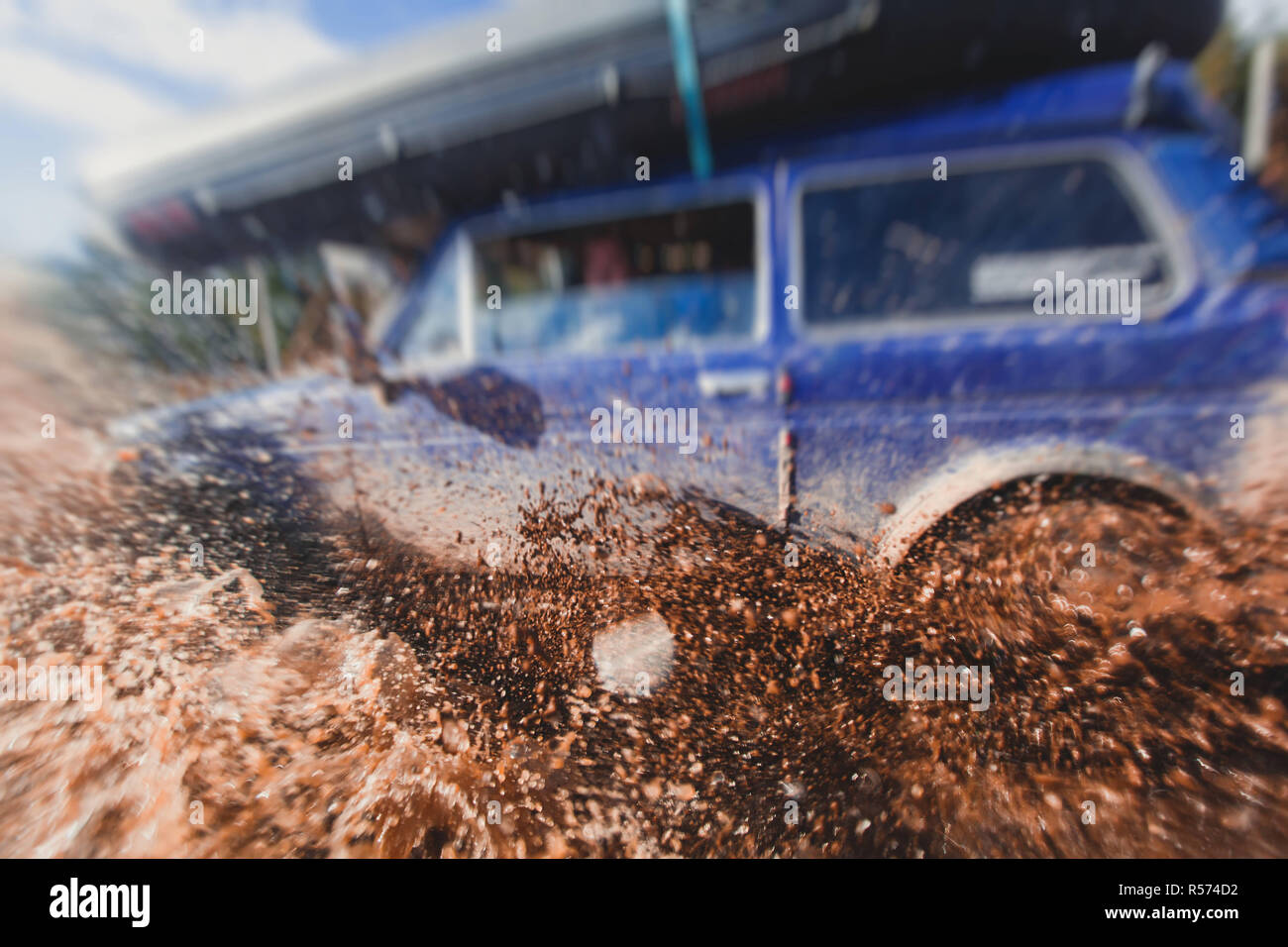 Suv offroad 4wd car rides through muddy puddle, off-road track road ...