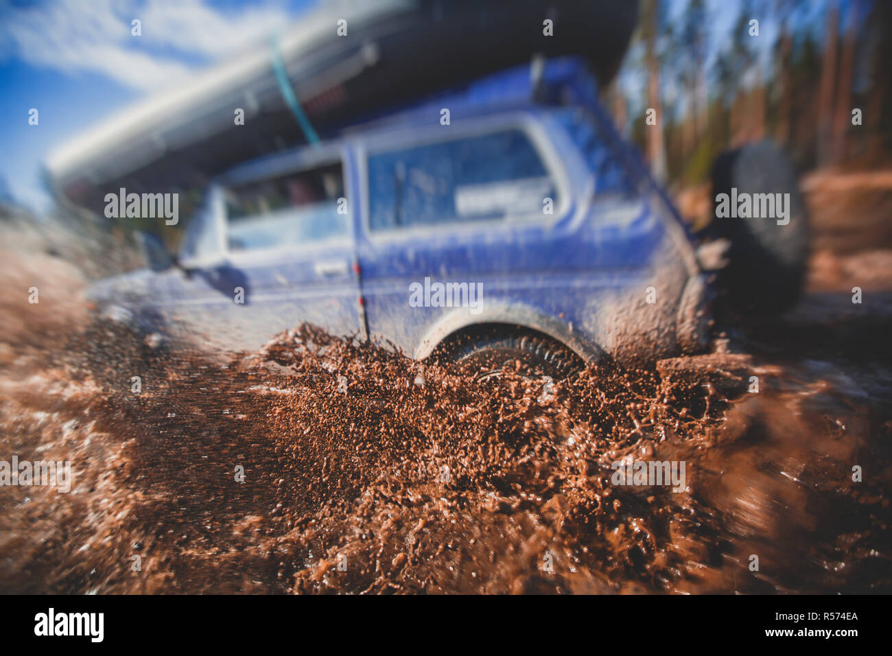 Suv offroad 4wd car rides through muddy puddle, off-road track road ...