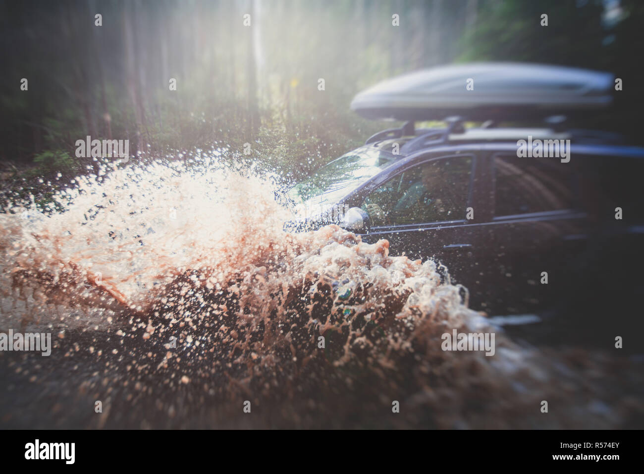 Suv offroad 4wd car rides through muddy puddle, off-road track road ...