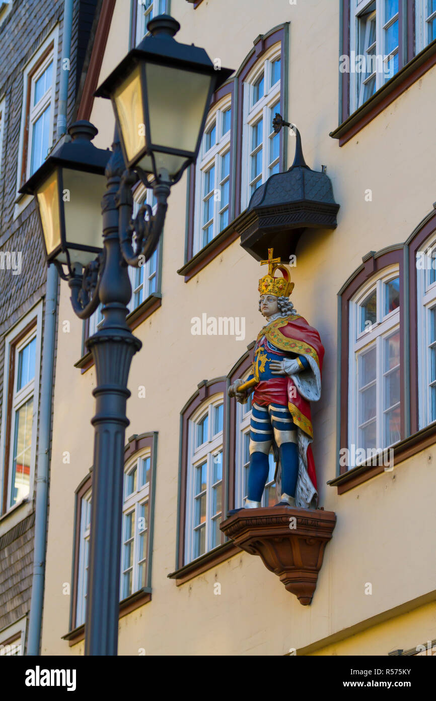 historical figure on the house facade Stock Photo - Alamy