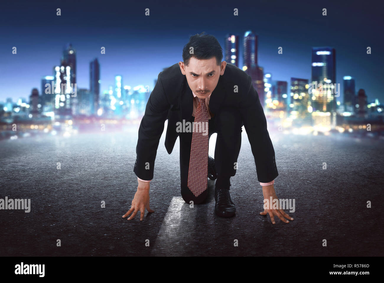 Executive in running pose hi-res stock photography and images - Alamy