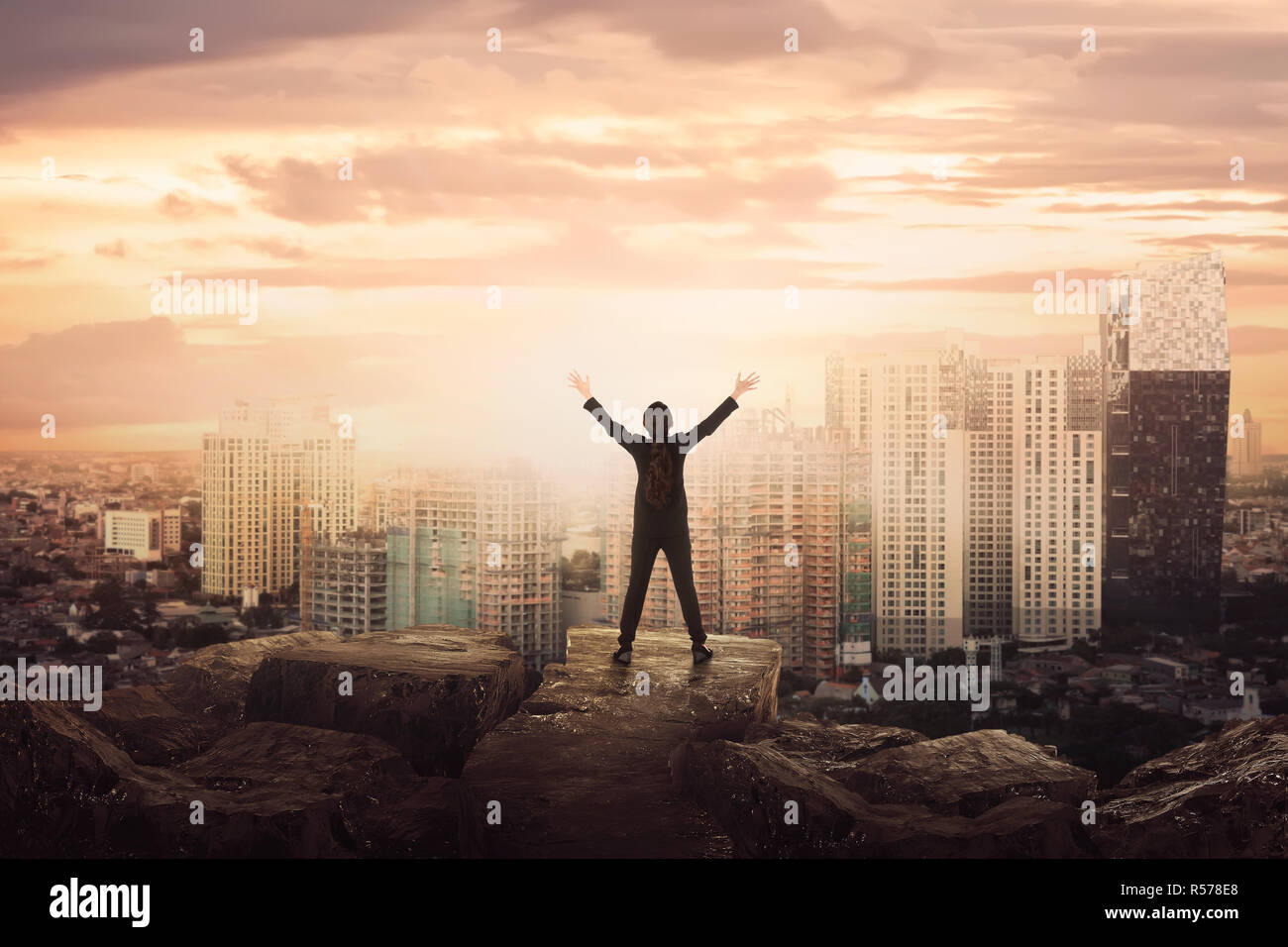 Back view of asian business woman celebrating success Stock Photo - Alamy