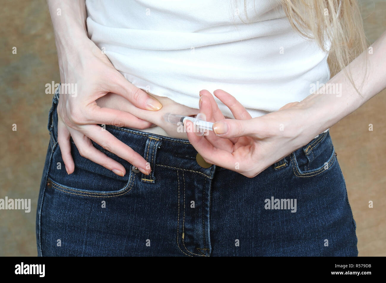Stomach insulin injection Stock Photo - Alamy