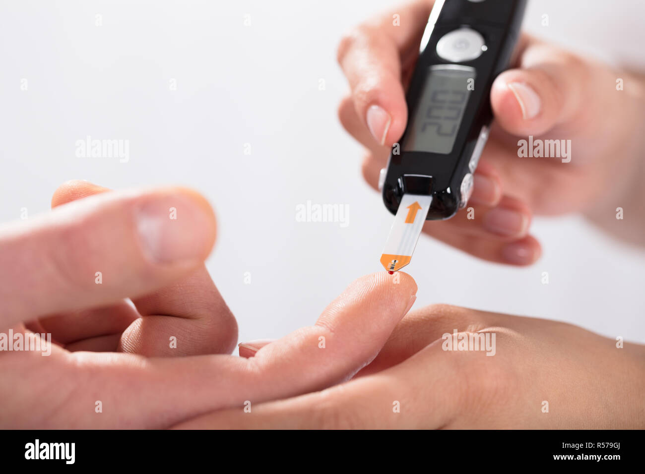 Finger Prick For Glucose Sugar Measuring Level Blood Test Stock Photo ... Finger Prick For Glucose Sugar Measuring Level Blood Test Stock Photo ...