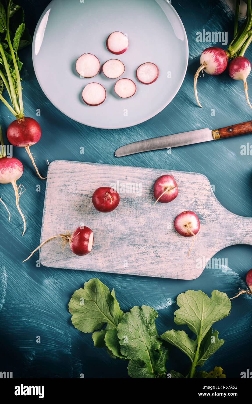 Whole and slice of radishes Stock Photo - Alamy