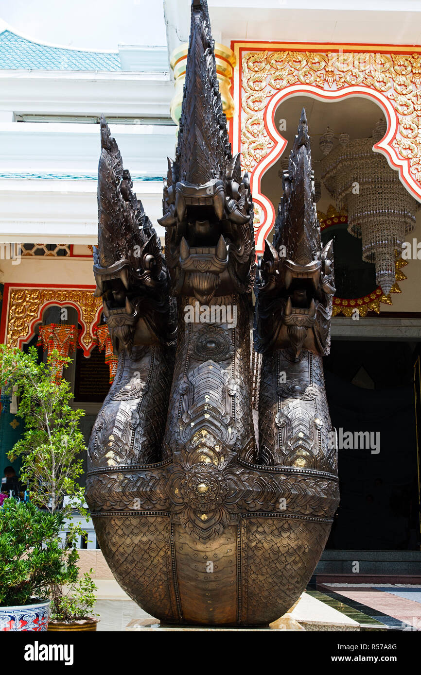 bronze many heads snake buddha traditional Stock Photo - Alamy