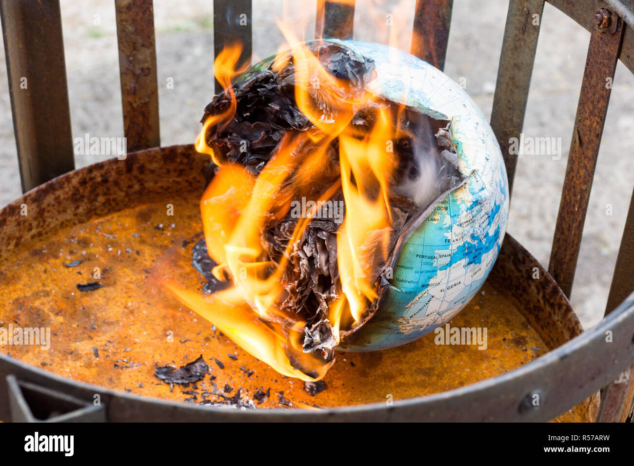 Flames fire earth globe hi-res stock photography and images - Alamy