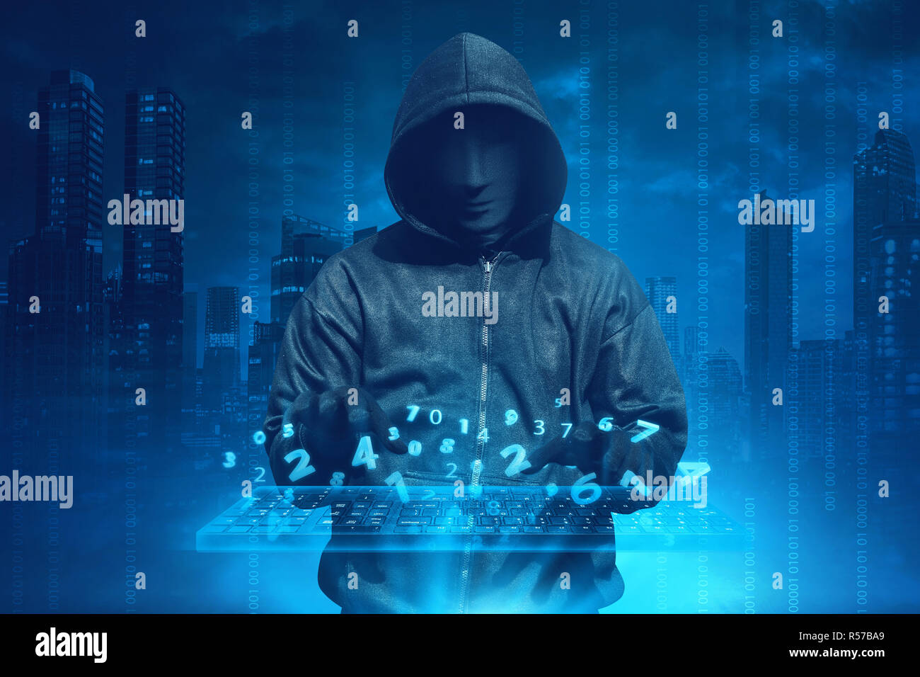 Hooded man with anonymous mask hacking system online security Stock ...