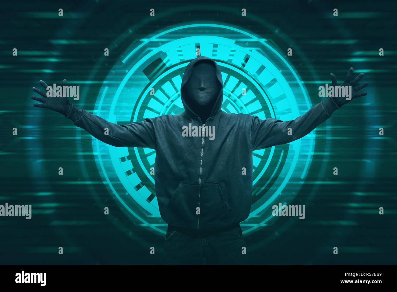 Hooded hacker with anonymous mask expression Stock Photo - Alamy