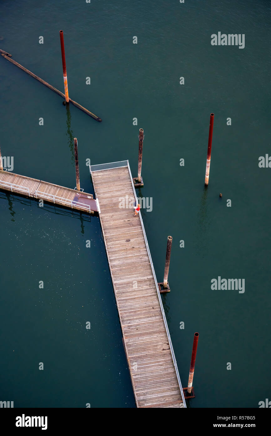 Modern shot from above. A woman and a man are standing on the edge of a ...