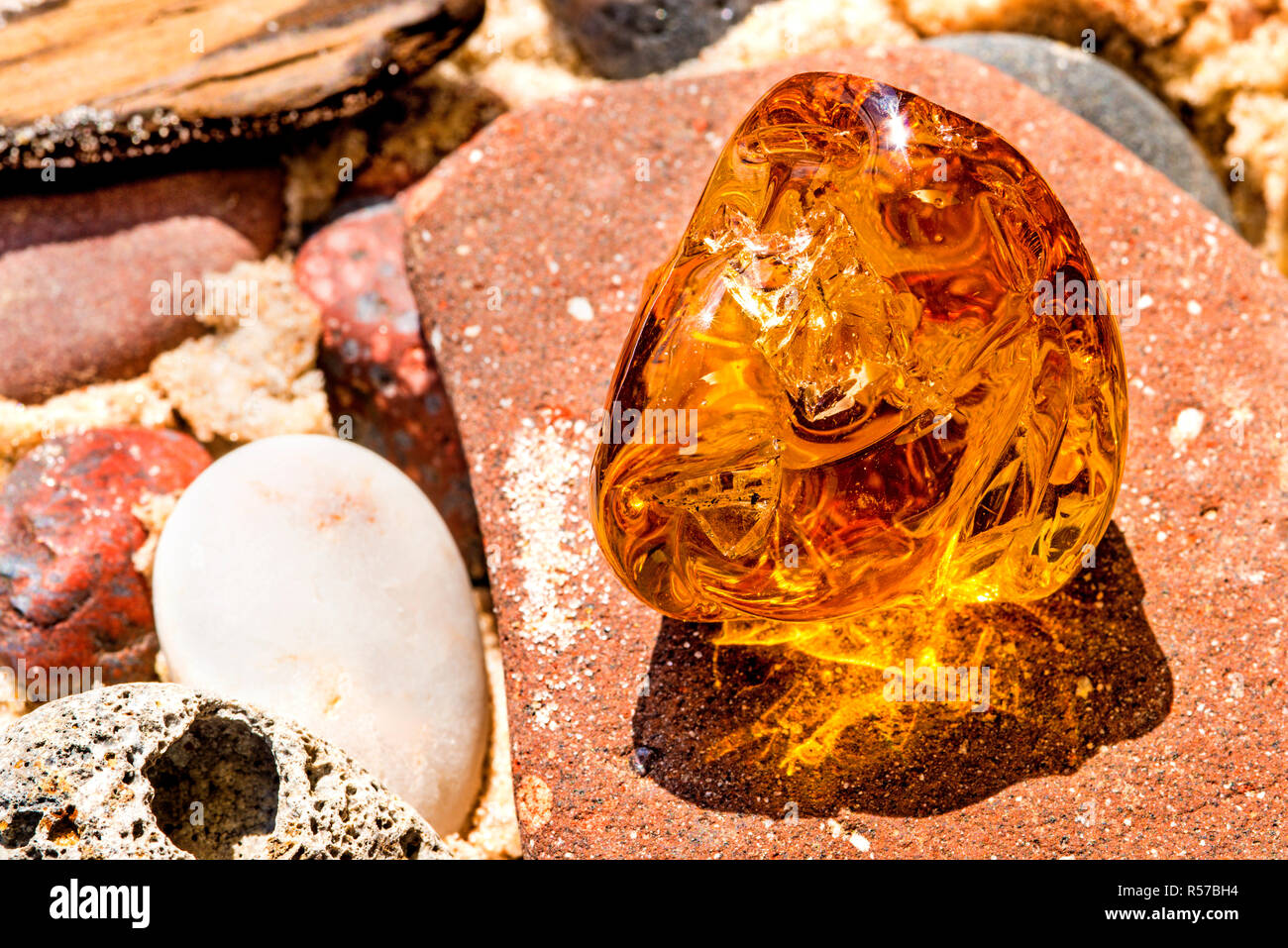 amber on the baltic sea beach Stock Photo - Alamy