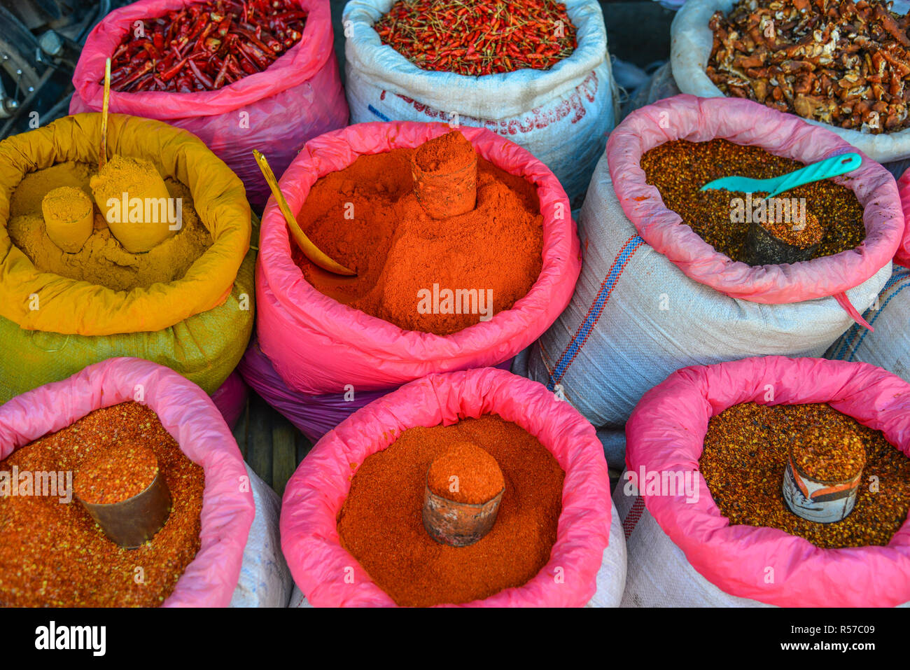 Colored spices at local market in Yangon, Myanmar Stock Photo - Alamy