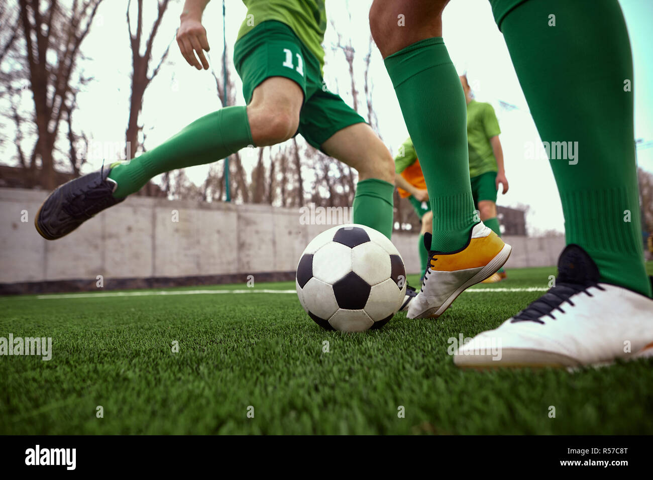 The legs of soccer football player Stock Photo - Alamy