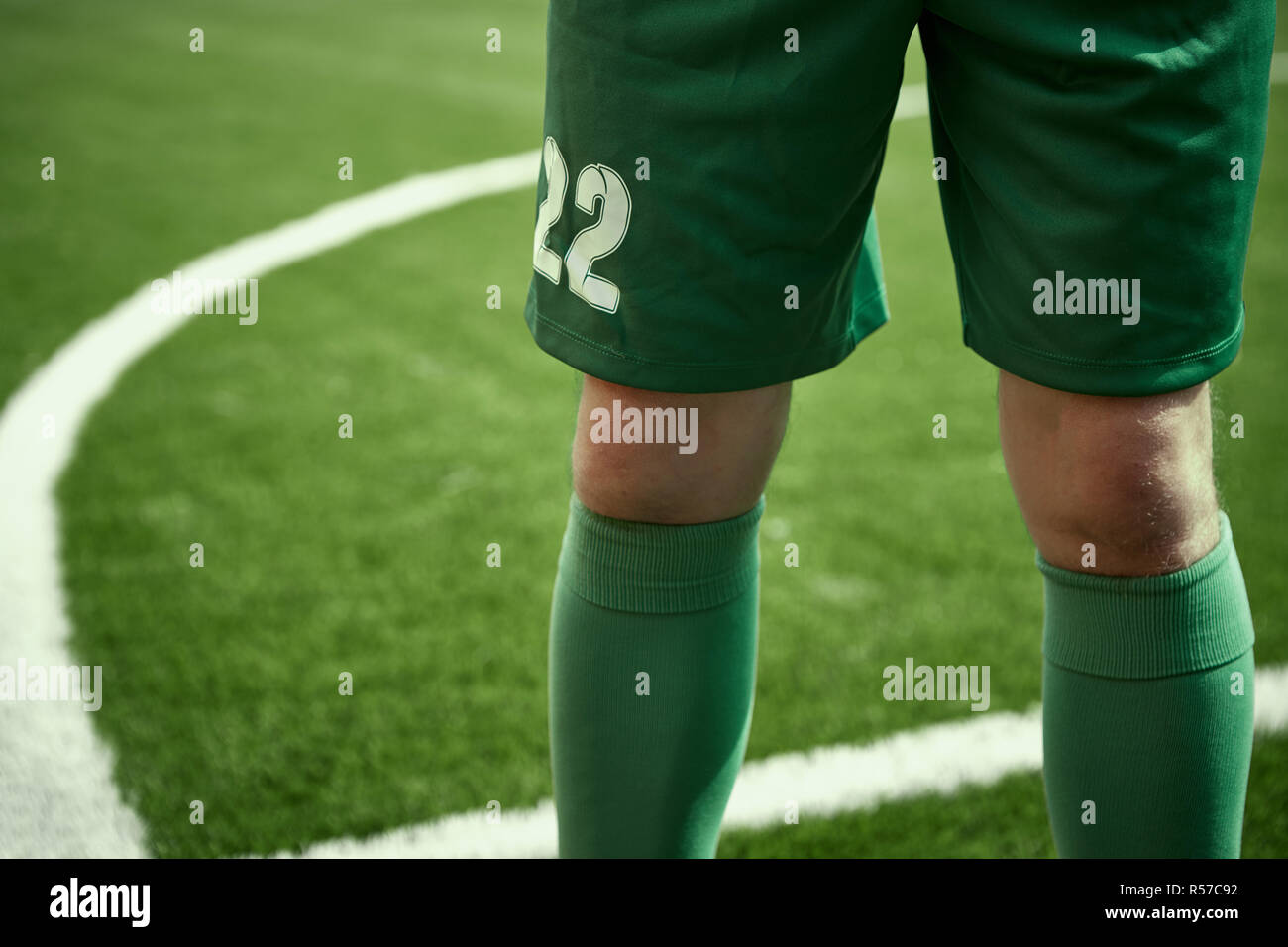 The legs of soccer football player Stock Photo - Alamy