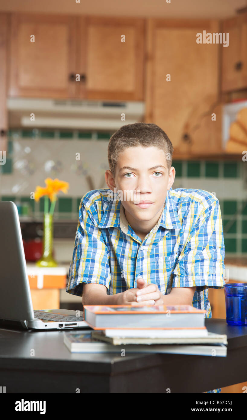 Latino teen boy serious hi-res stock photography and images - Alamy