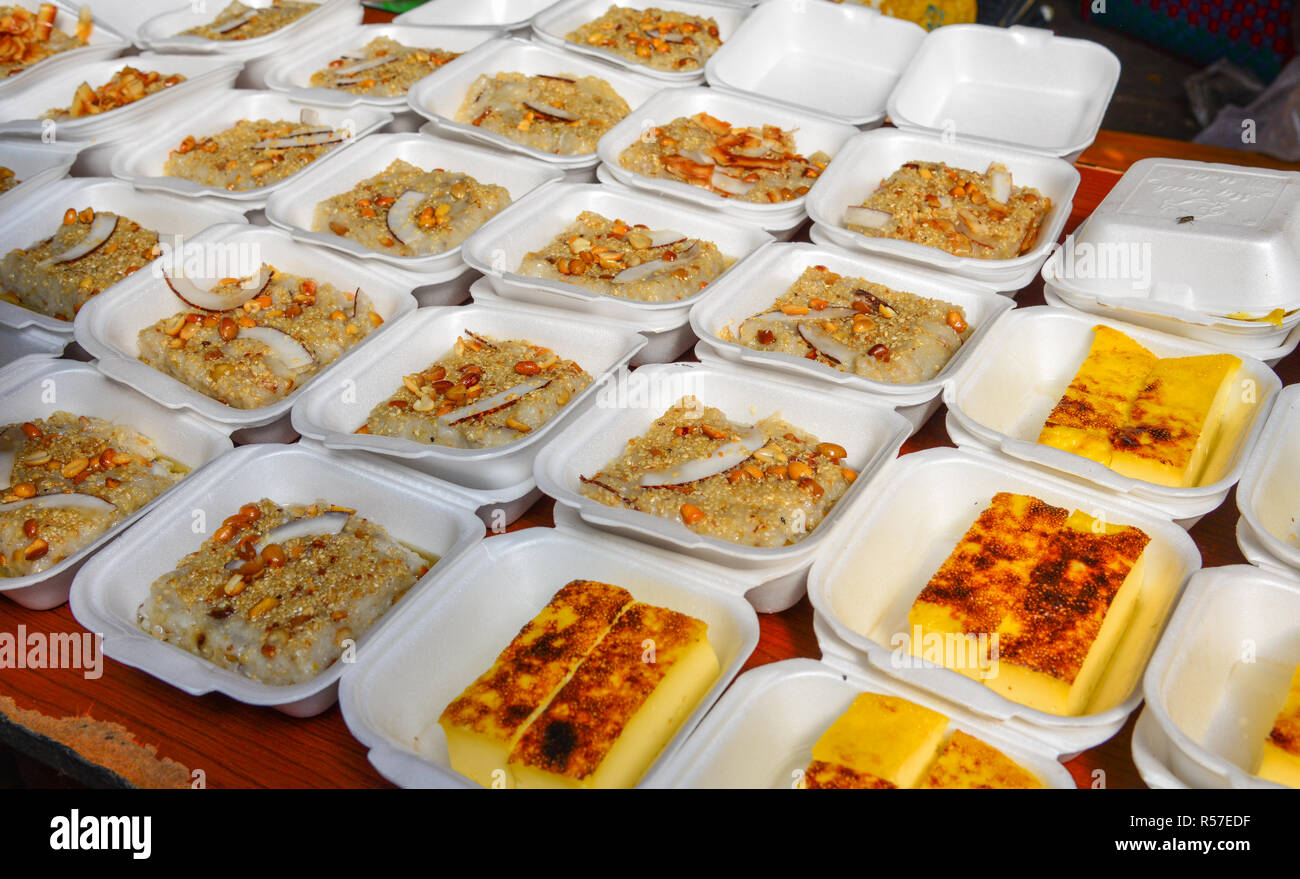 Sweet cakes at local market in Yangon, Myanmar Stock Photo - Alamy