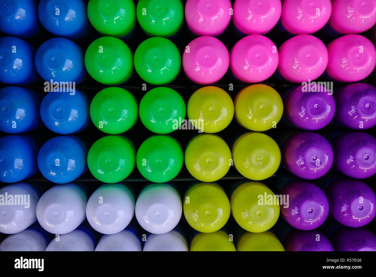 Colorful plastic bottles for sale at the market. Colorful pattern Stock ...
