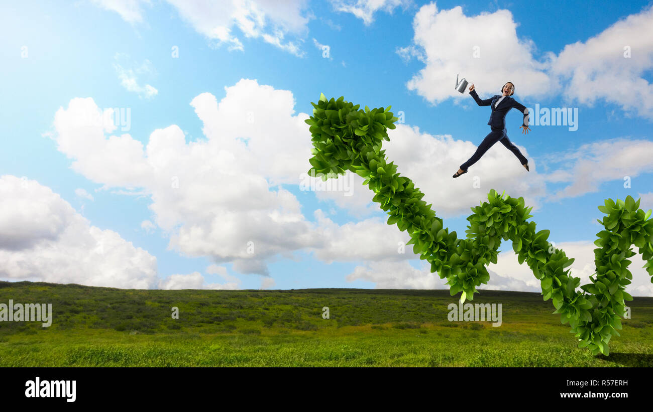 Making big success jump . Mixed media Stock Photo - Alamy