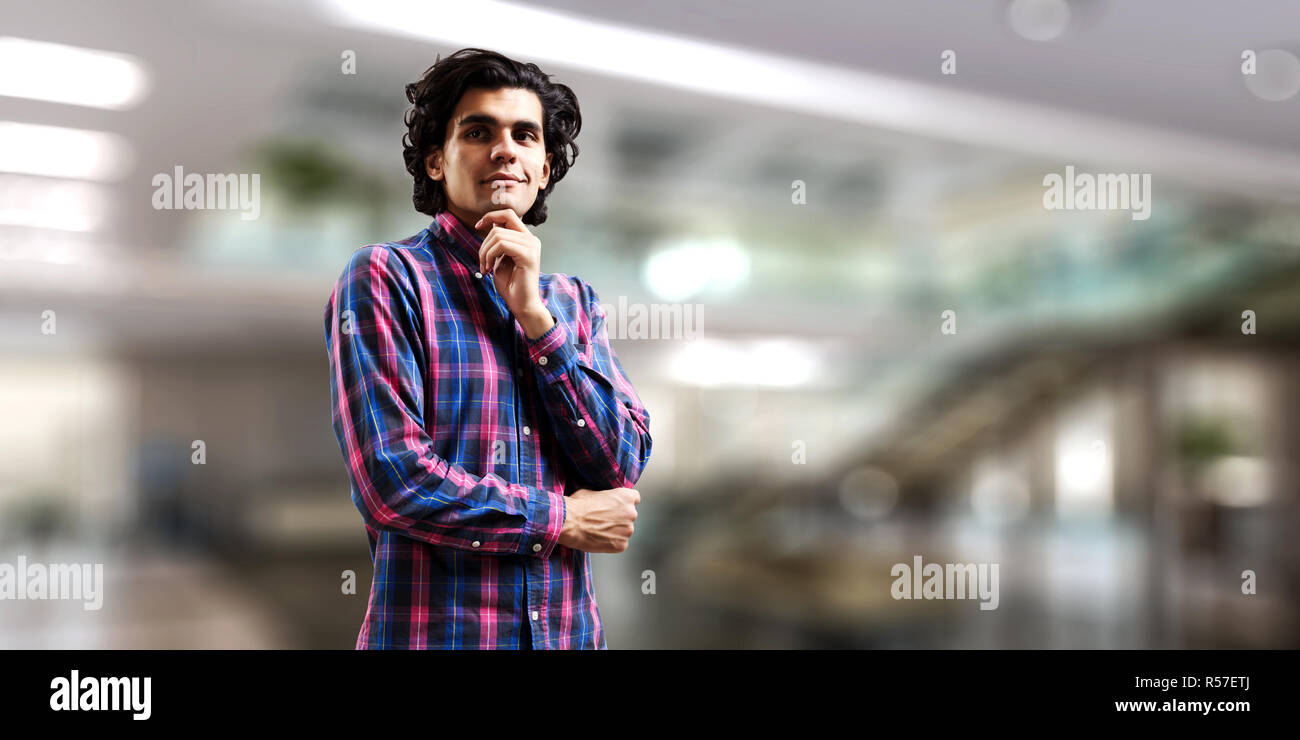 Casual man thinking over an idea Stock Photo - Alamy