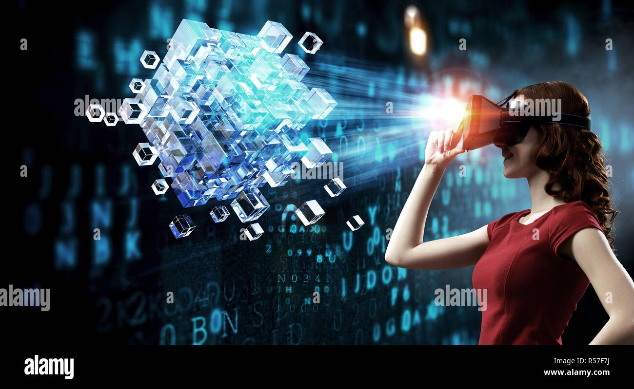 Experiencing virtual technology world. Mixed media Stock Photo - Alamy