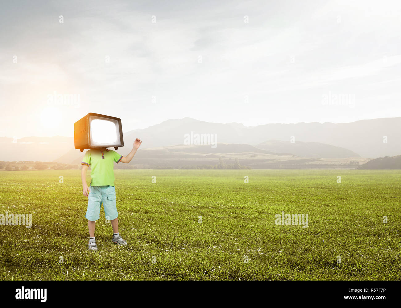 TV addicted children. Mixed media Stock Photo - Alamy