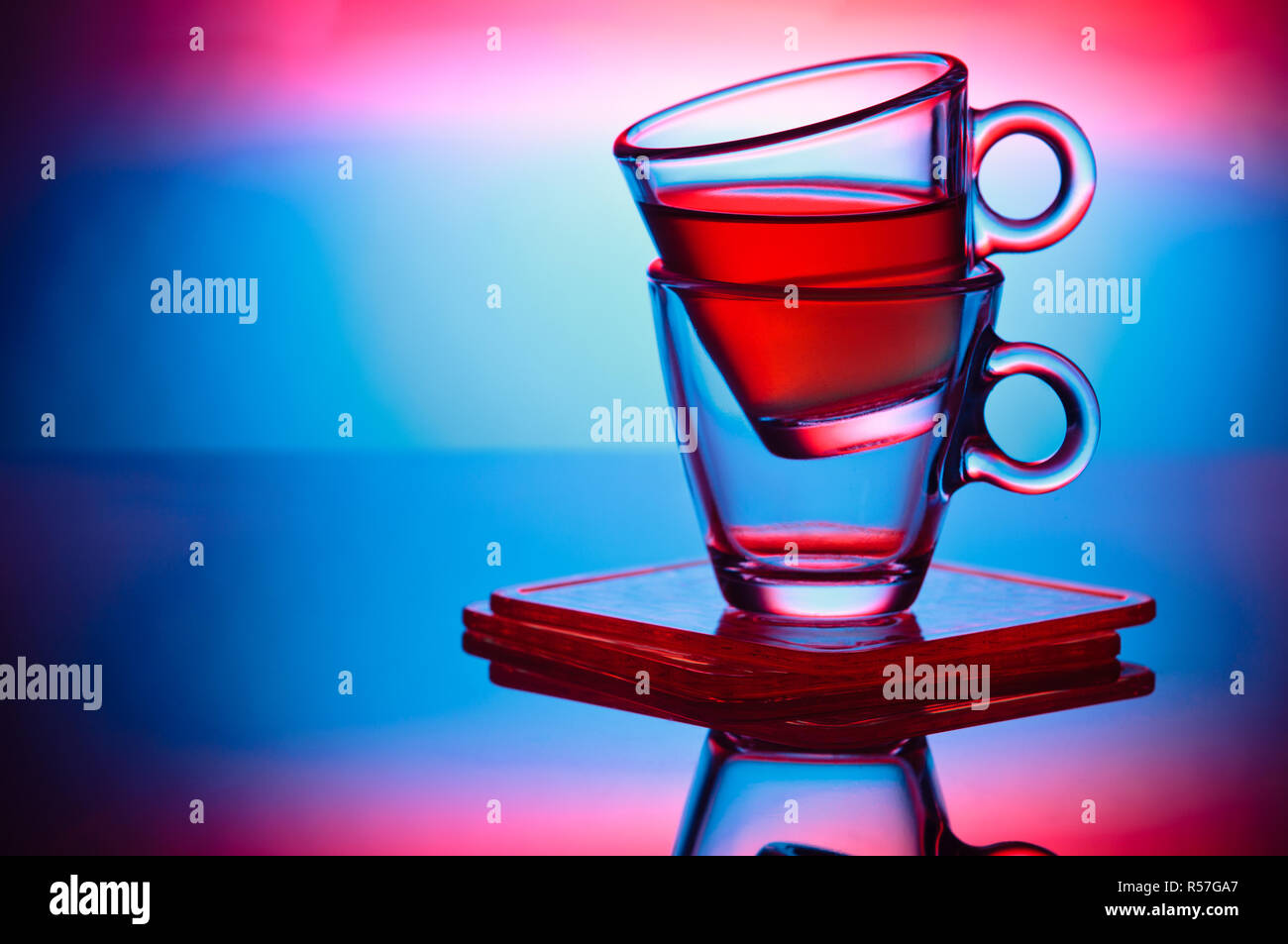 Transparent cups with reflection Stock Photo - Alamy