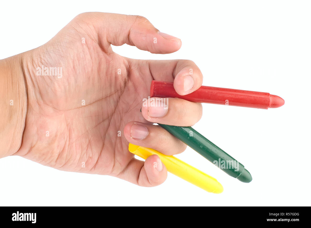 Hand Holds Three Crayons Stock Photo - Alamy