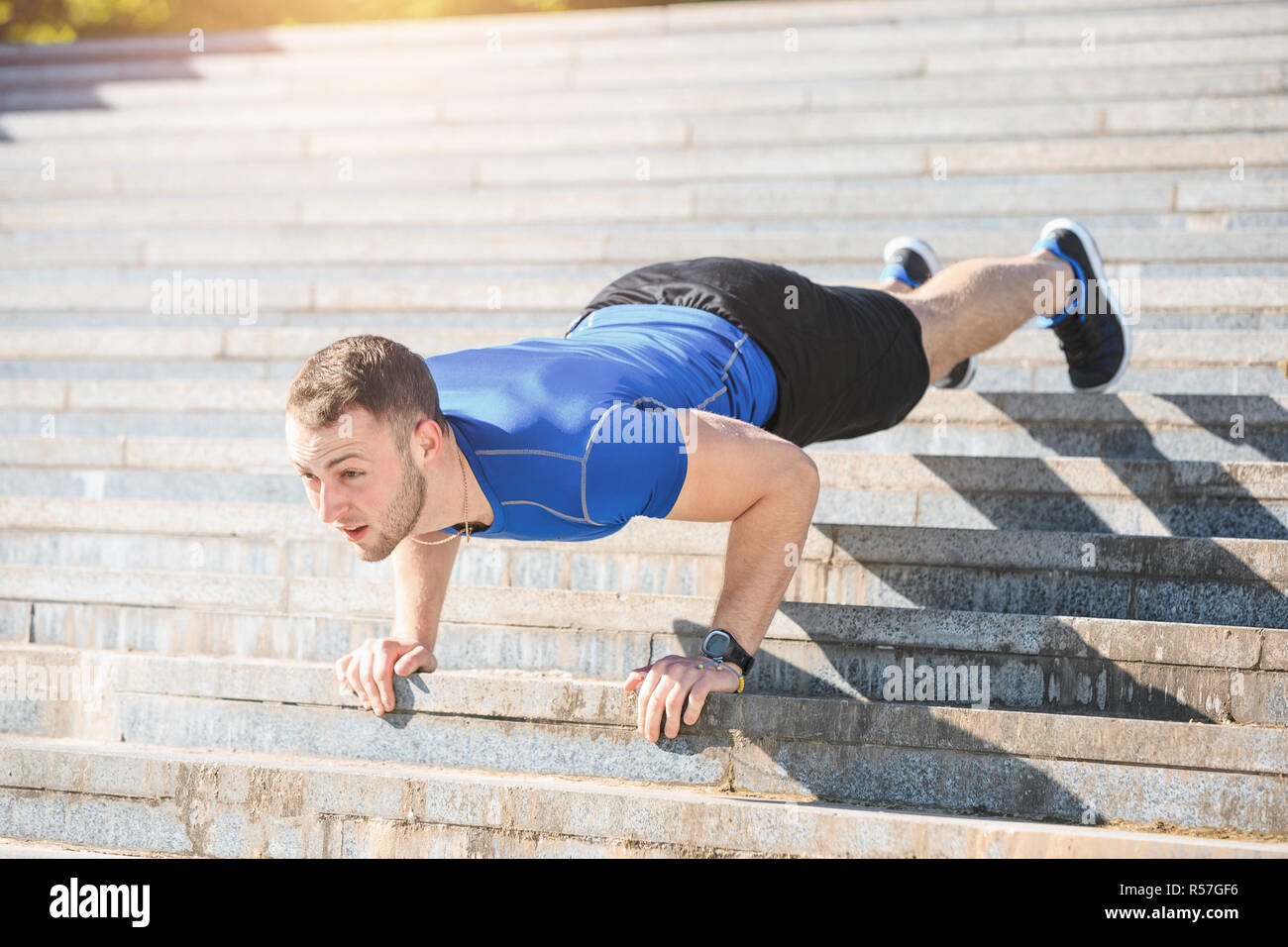 Man workout pump doing male hi-res stock photography and images - Alamy