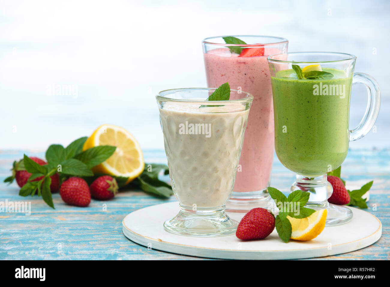 Different milkshakes on the table Stock Photo - Alamy